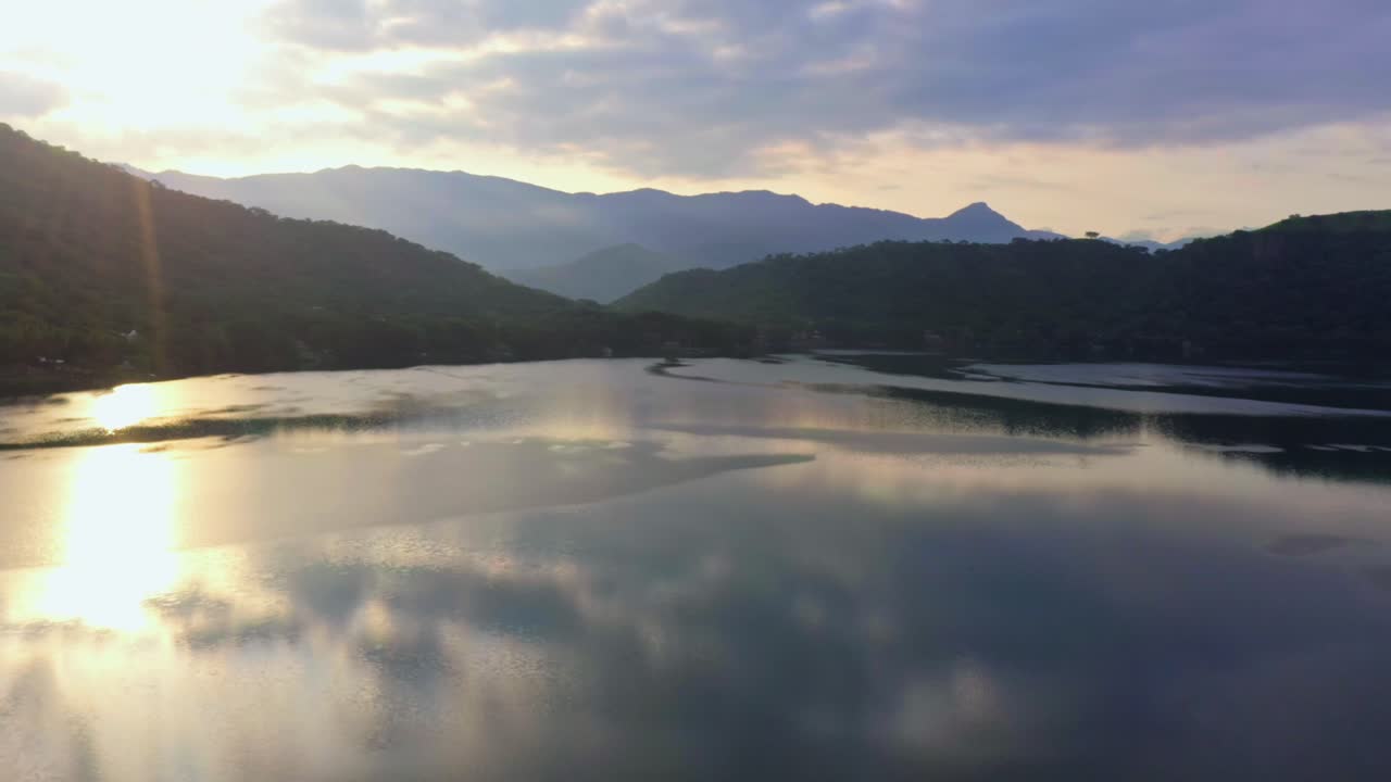 Sunset Reflections on Hillbound Lake - Free Stock Video