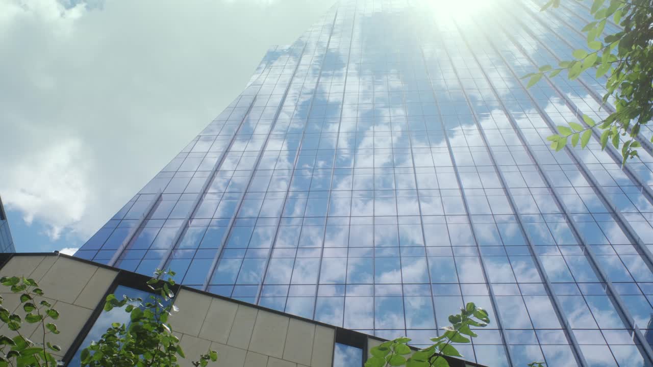 Time Lapse of Sky Reflecting on a Building - Free Stock Video