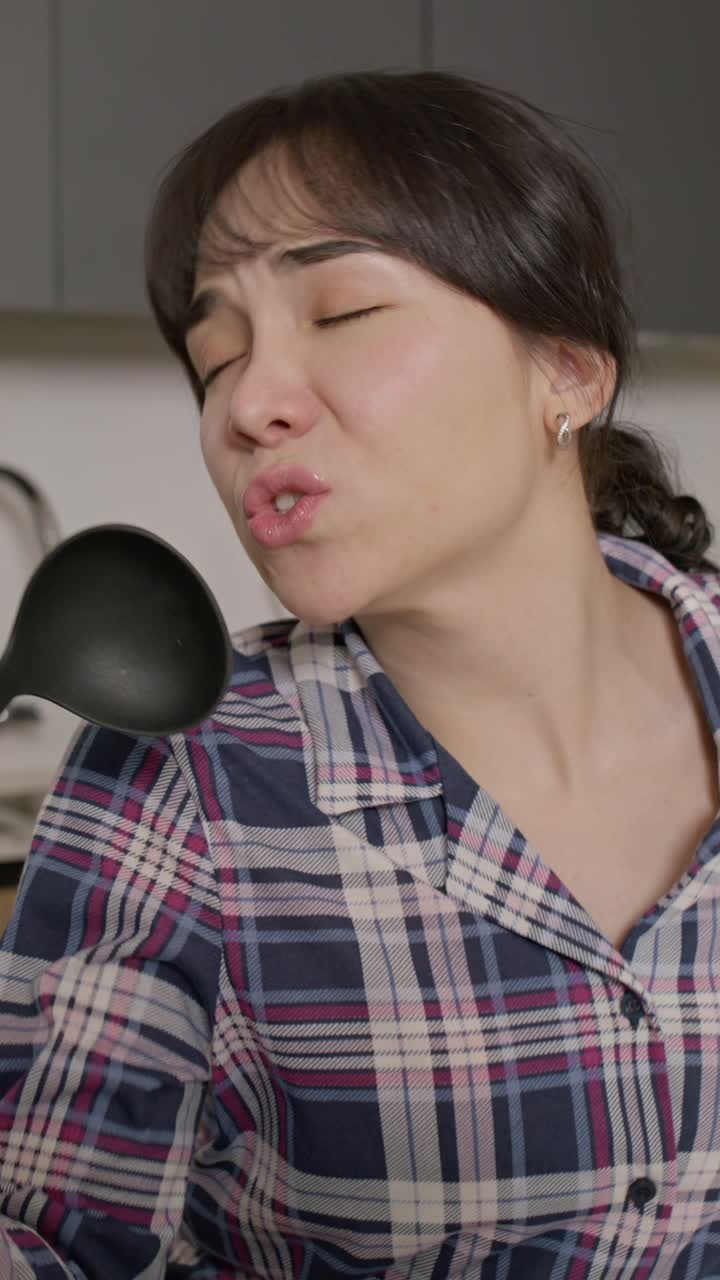 Inspired Singing With Ladle Mic - Free Stock Video