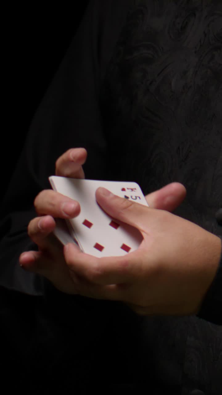 Hands Shuffling a Deck of Cards - Free Stock Video