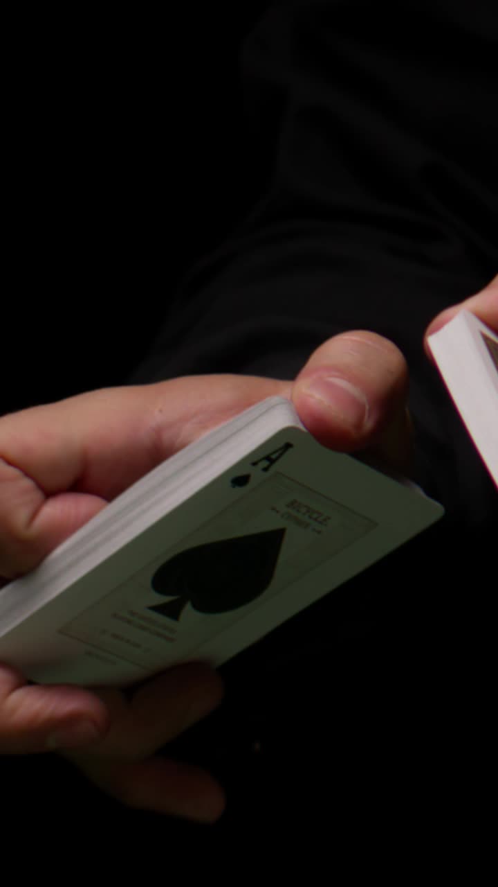 Shuffling a deck of playing cards - Free Stock Video