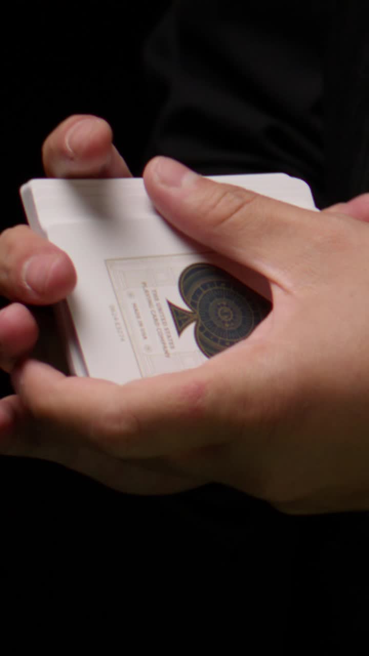 Card trick in action with a deck of playing cards - Free Stock Video
