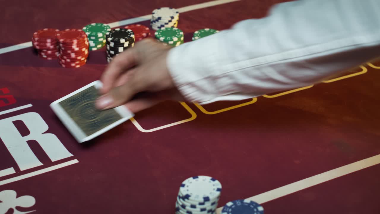 Poker hand reveal with chips on the table - Free Stock Video