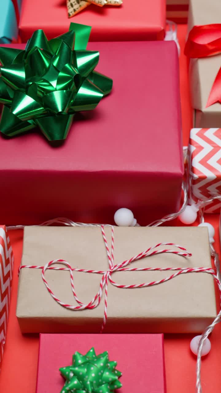 A collection of gifts beautifully wrapped with colorful papers and ...