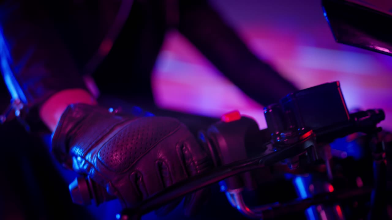 Close up to the motorcycle handlebar with vibrant Lighting in the ...