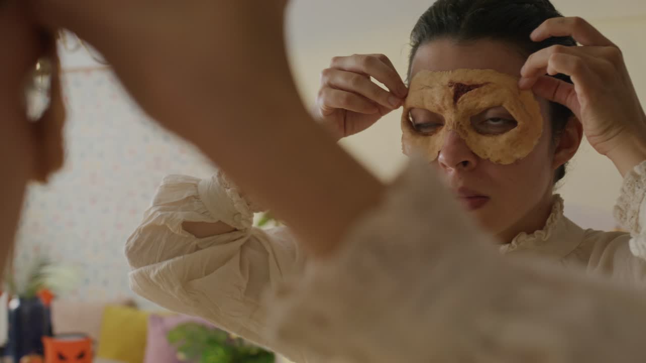 Makeup Artist Adjusting Monster Prosthetics - Free Stock Video