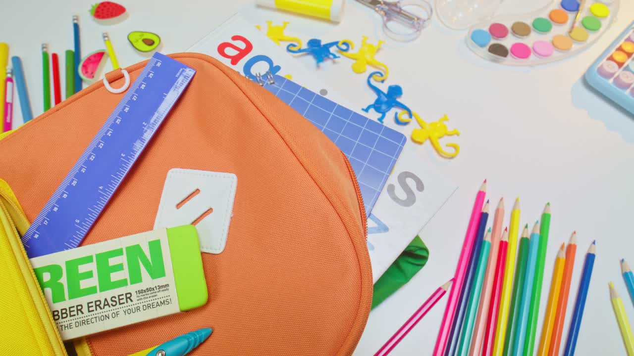 Overhead Shot of Colorful School Supplies - Free Stock Video