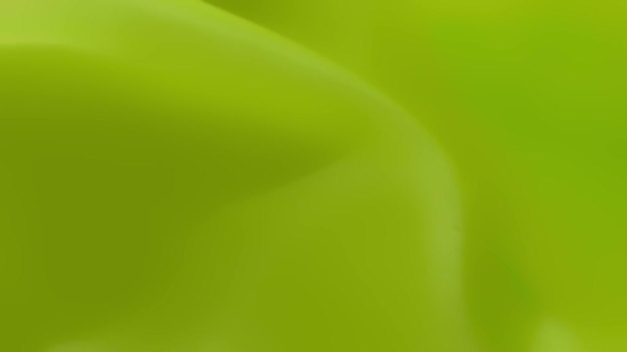 Glossy Lemon Green Waves Background - Free Stock Video