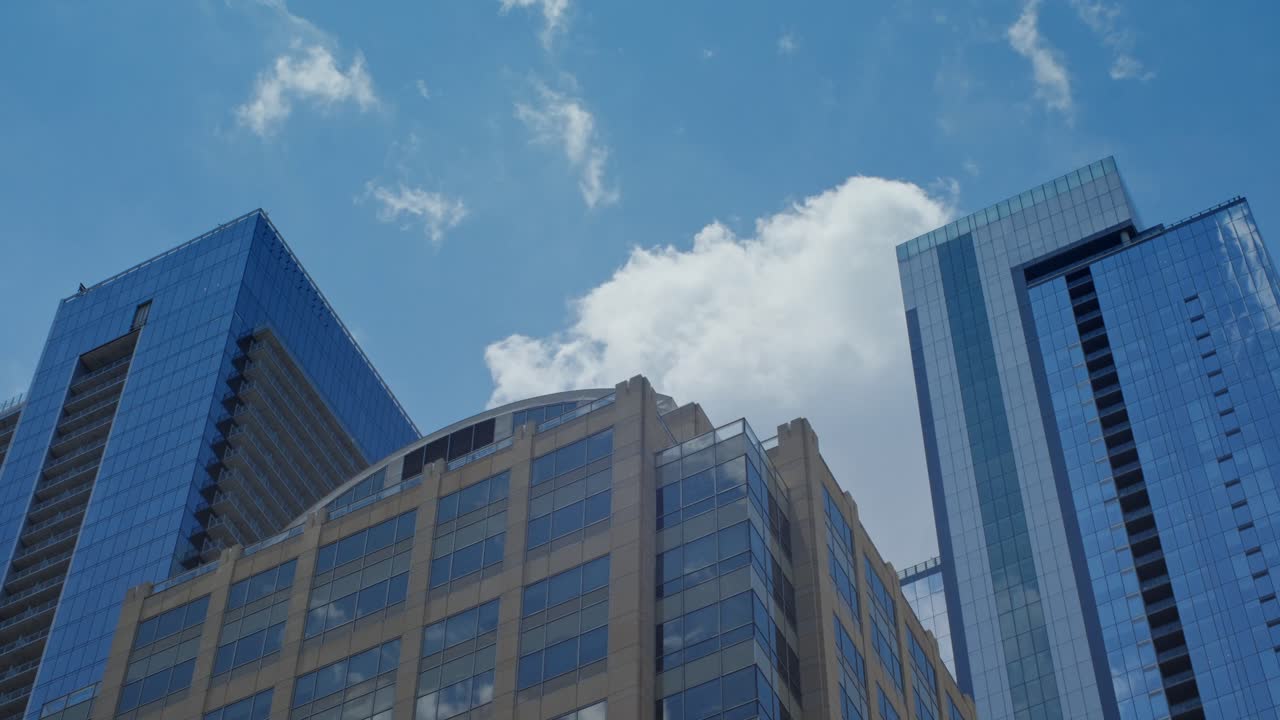 Fast-Motion Sky Reflections on Buildings - Free Stock Video