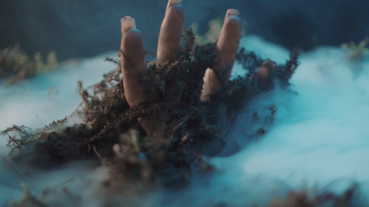 Hand Emerging from the Ground - Free Stock Video