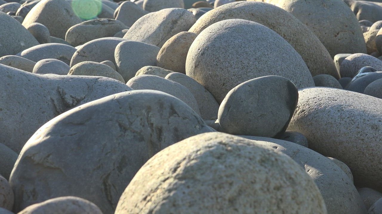 Natural round river stones - Free Stock Video