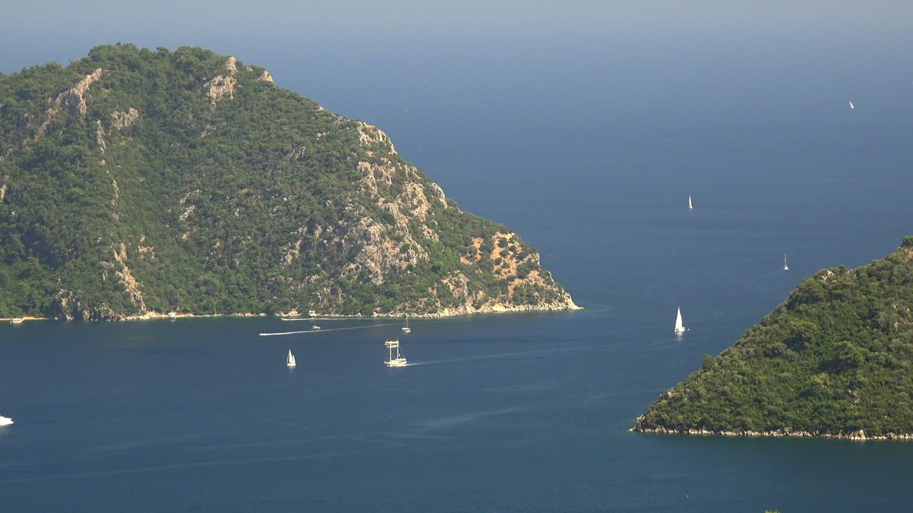 Sailing boats traffic in the ocean - Free Stock Video