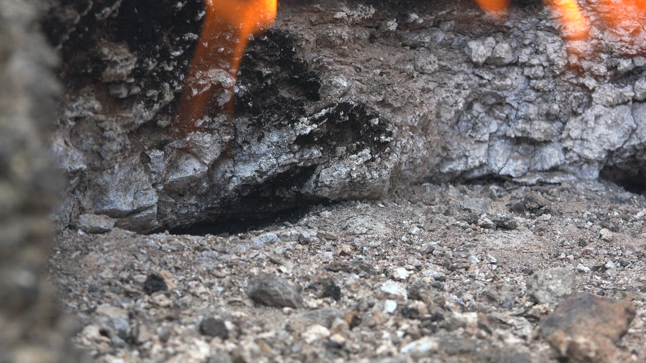 Burning flames in the rocks - Free Stock Video