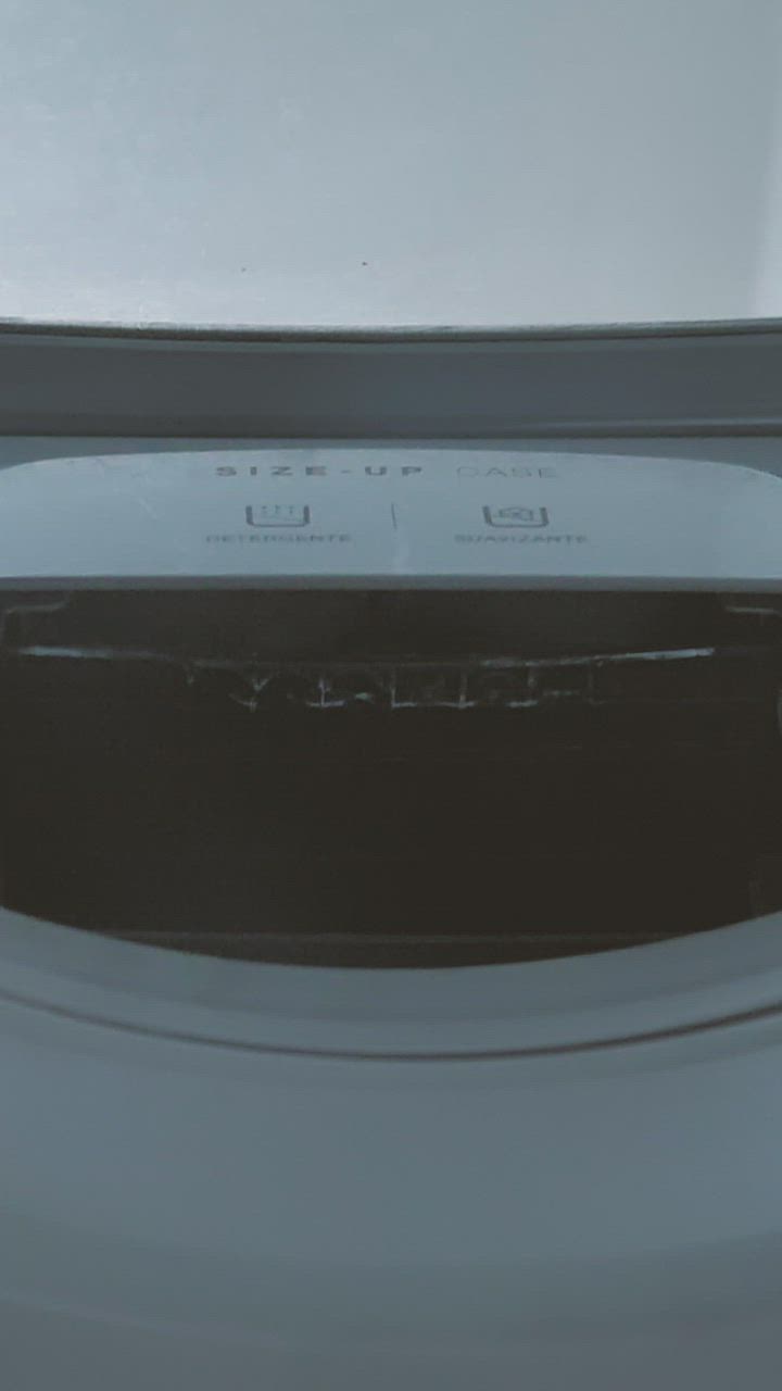 Inside of a washing machine while filling with water - Free Stock Video