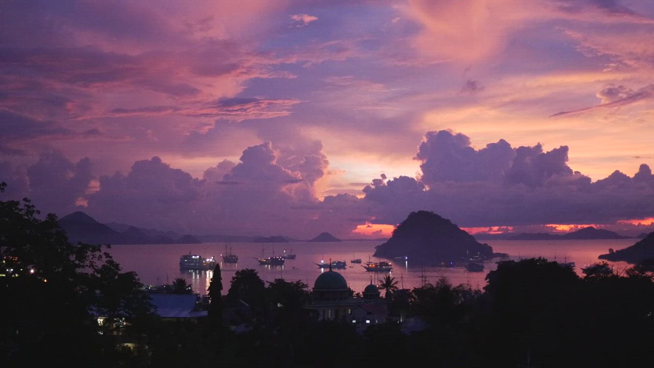 Amazing pink sunset on a tropical landscape - Free Stock Video