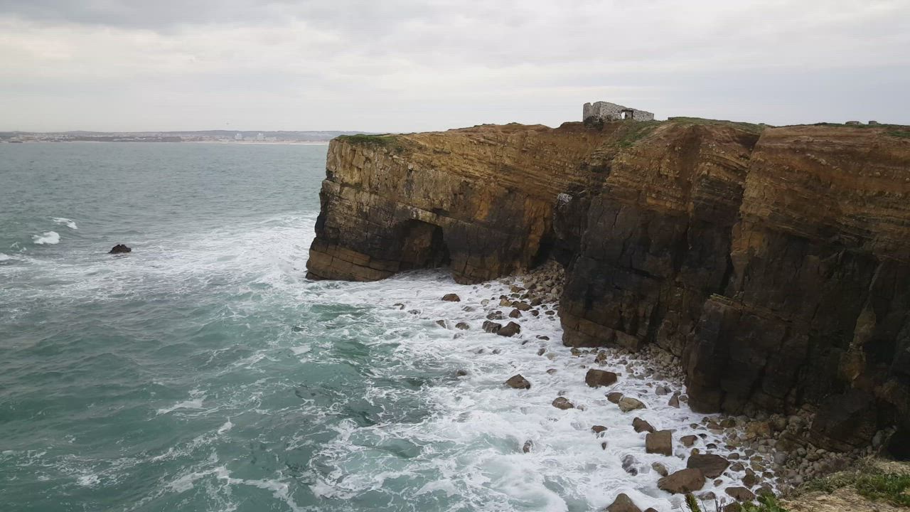 Crag on the seashore, high view - Free Stock Video