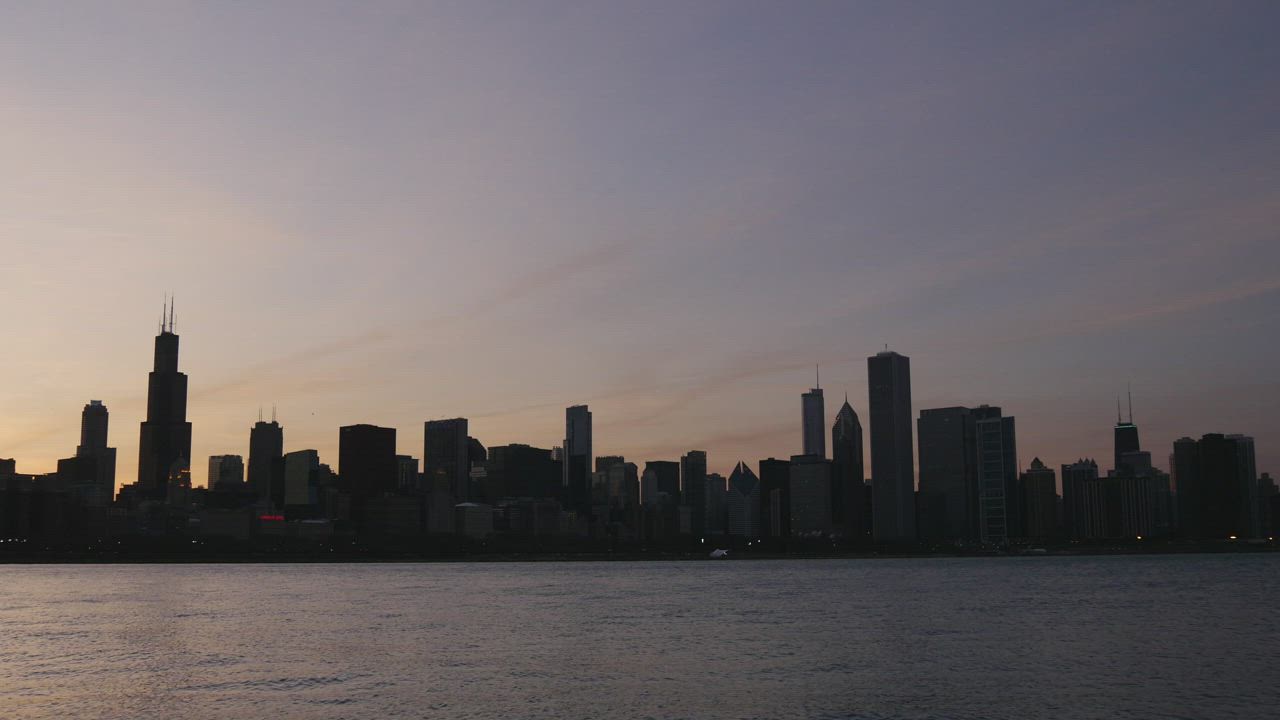 Buildings silhouettes and city lights in Chicago - Free Stock Video