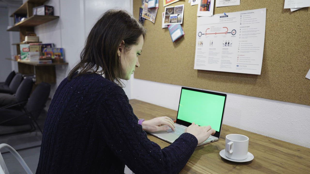 Woman typing quickly on a laptop - Free Stock Video