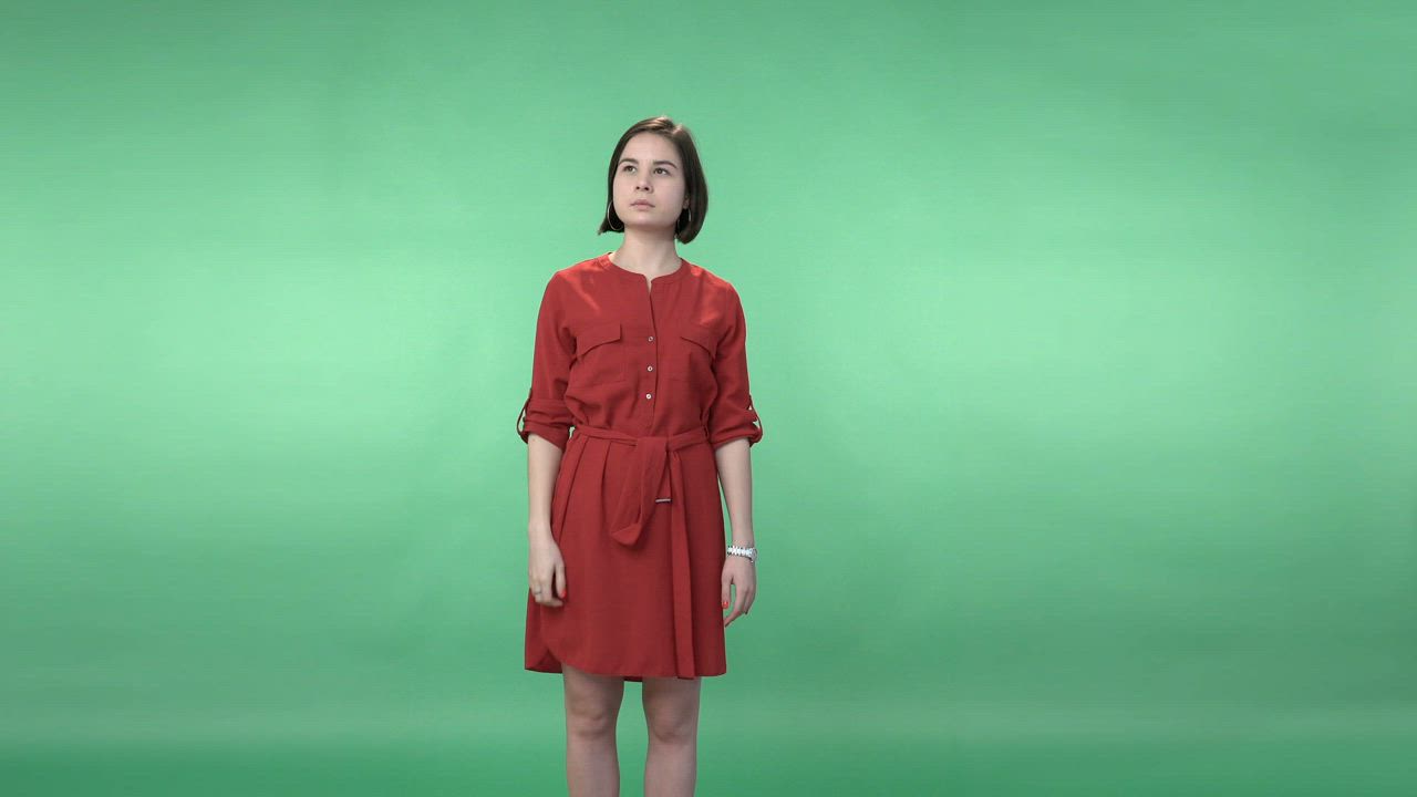 Woman in a dress using a virtual screen - Free Stock Video