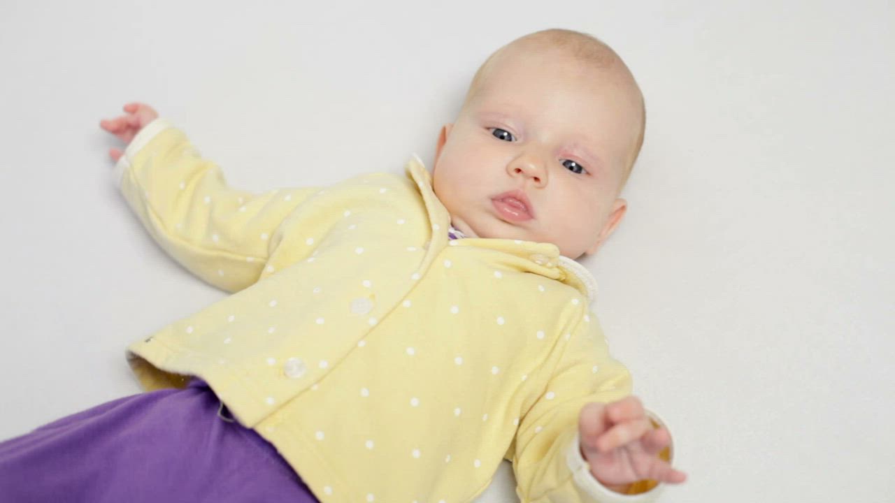 Baby moving their arms - Free Stock Video