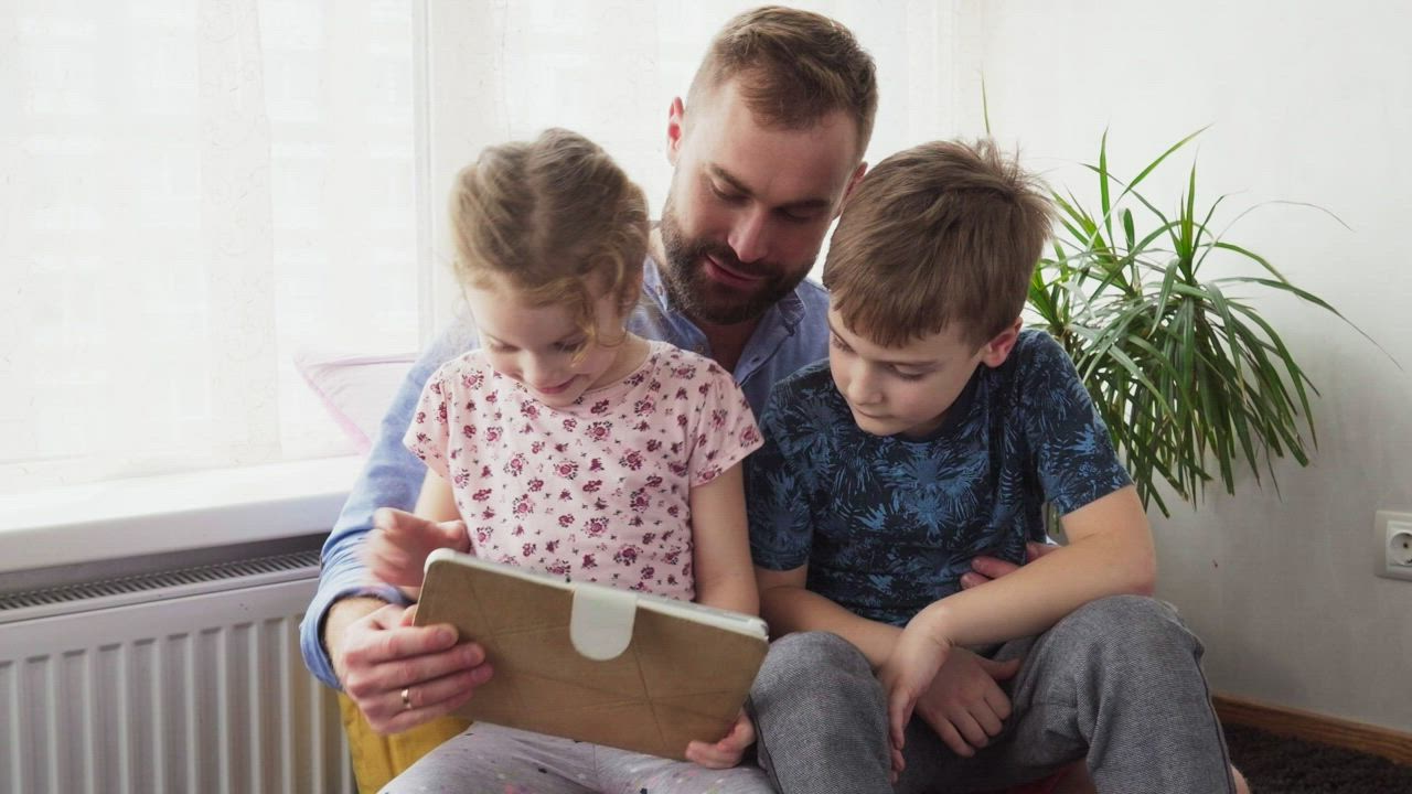 Children playing with a tablet - Free Stock Video