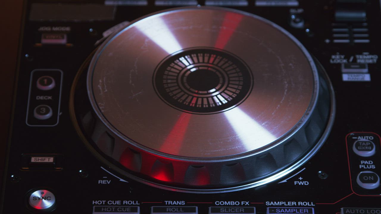 DJ using a turntable - Free Stock Video