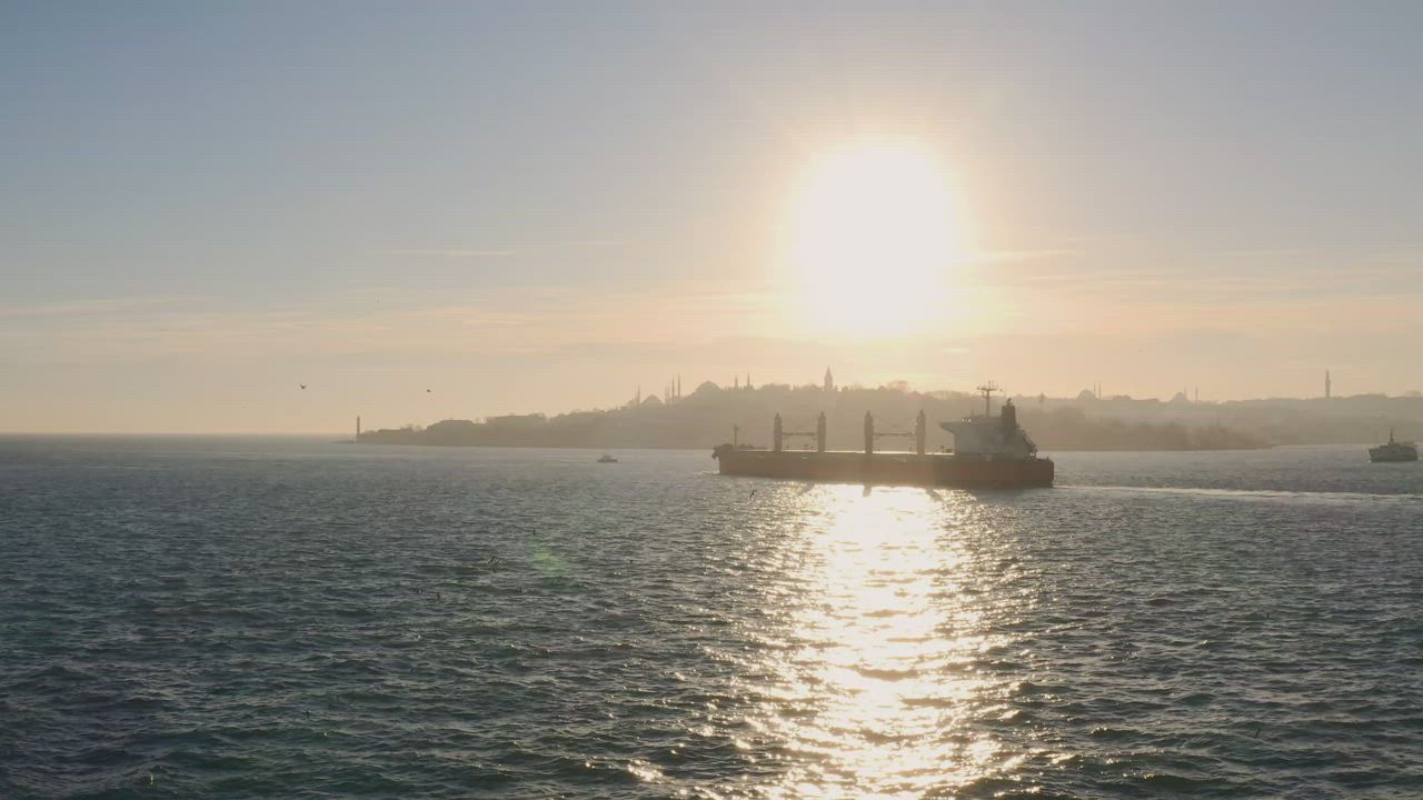 Cargo ship under the sun - Free Stock Video