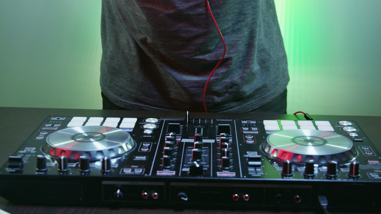 DJ working with their table - Free Stock Video
