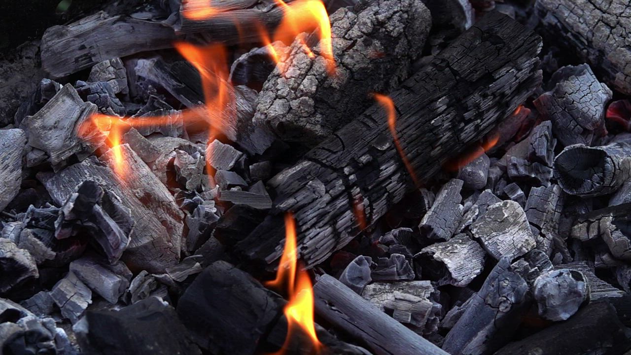 Burning ash covered coal - Free Stock Video