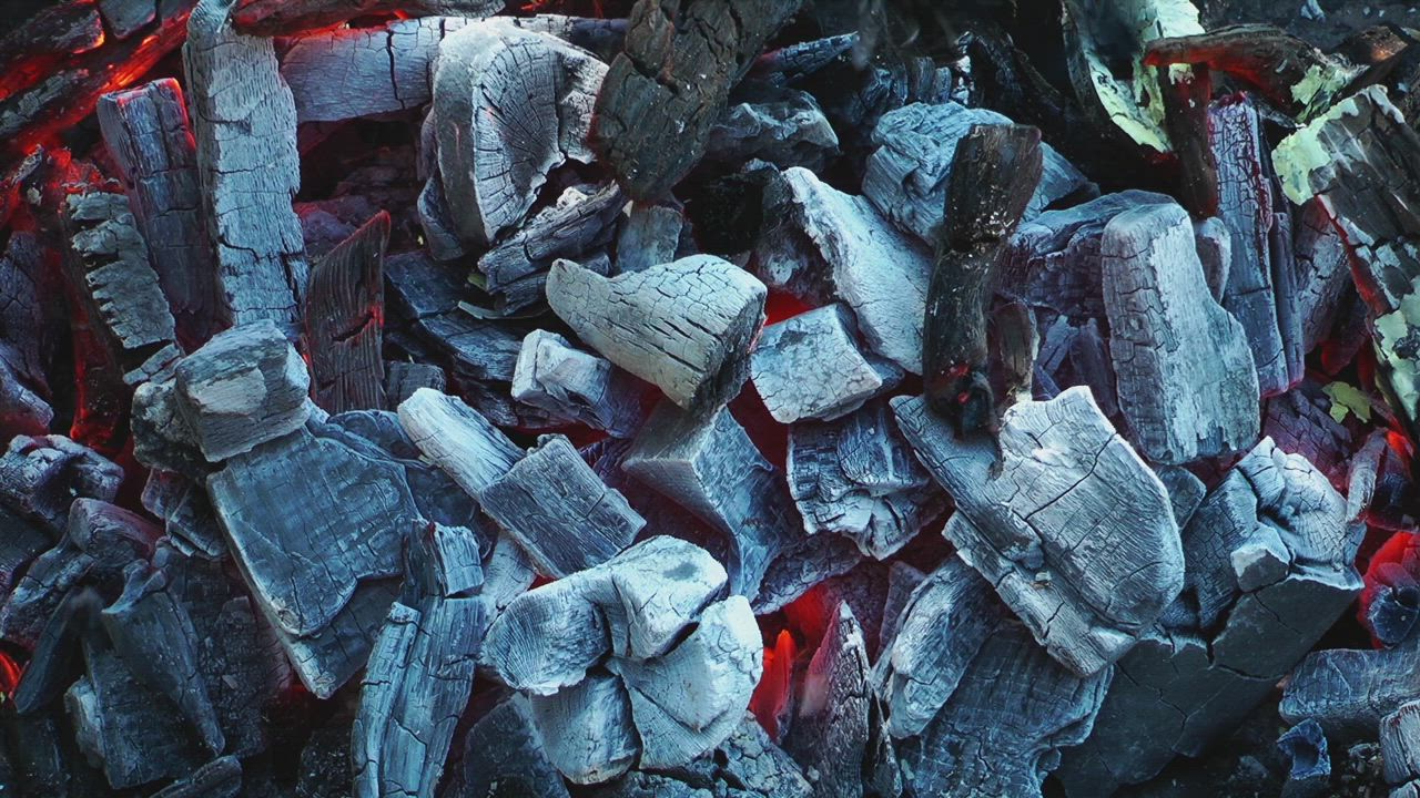 Coal in ashes by fire - Free Stock Video