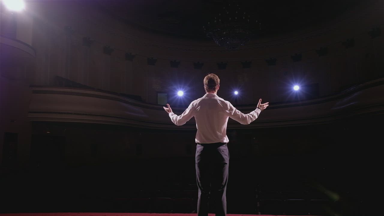 Man introduces himself to seminar audience - Free Stock Video
