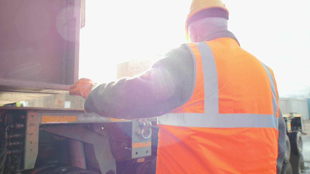 Men loading a freight truck - Free Stock Video