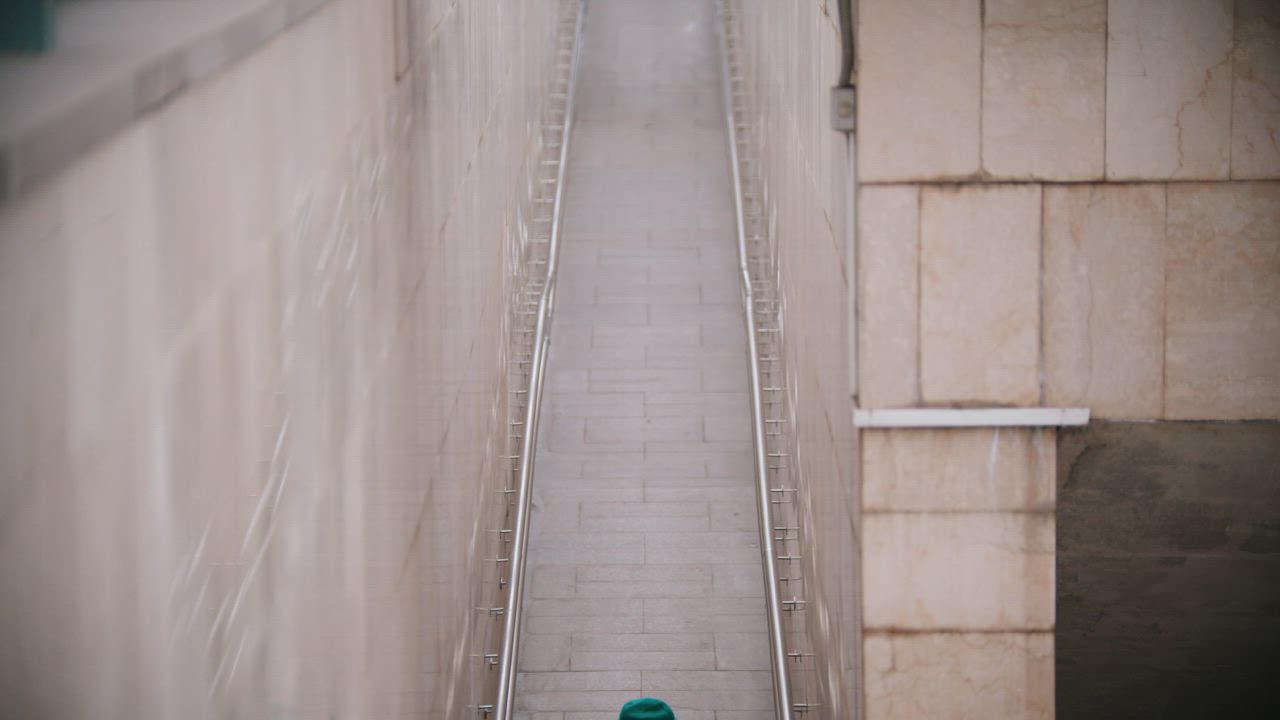 A disabled struggling to go up the ramp - Free Stock Video