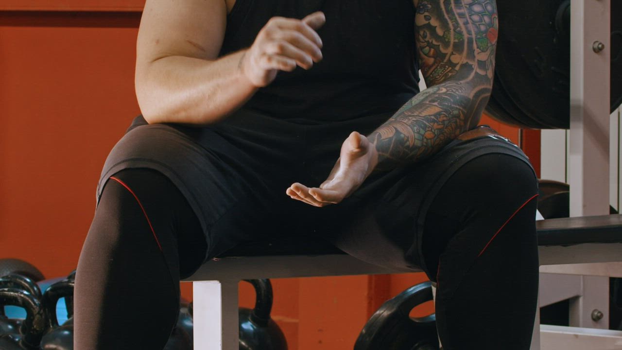 Man with a tattoo clapping his hands - Free Stock Video