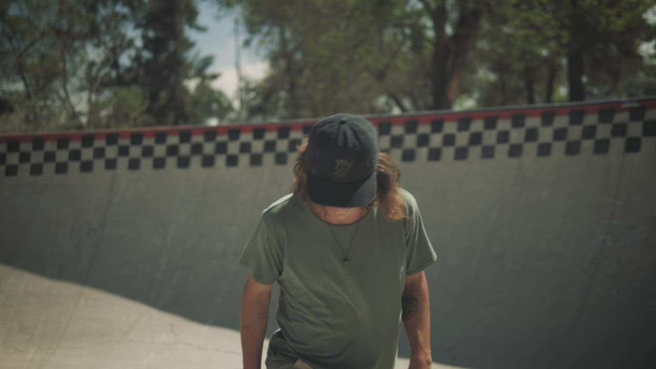 Front view of a skateboarder skating - Free Stock Video