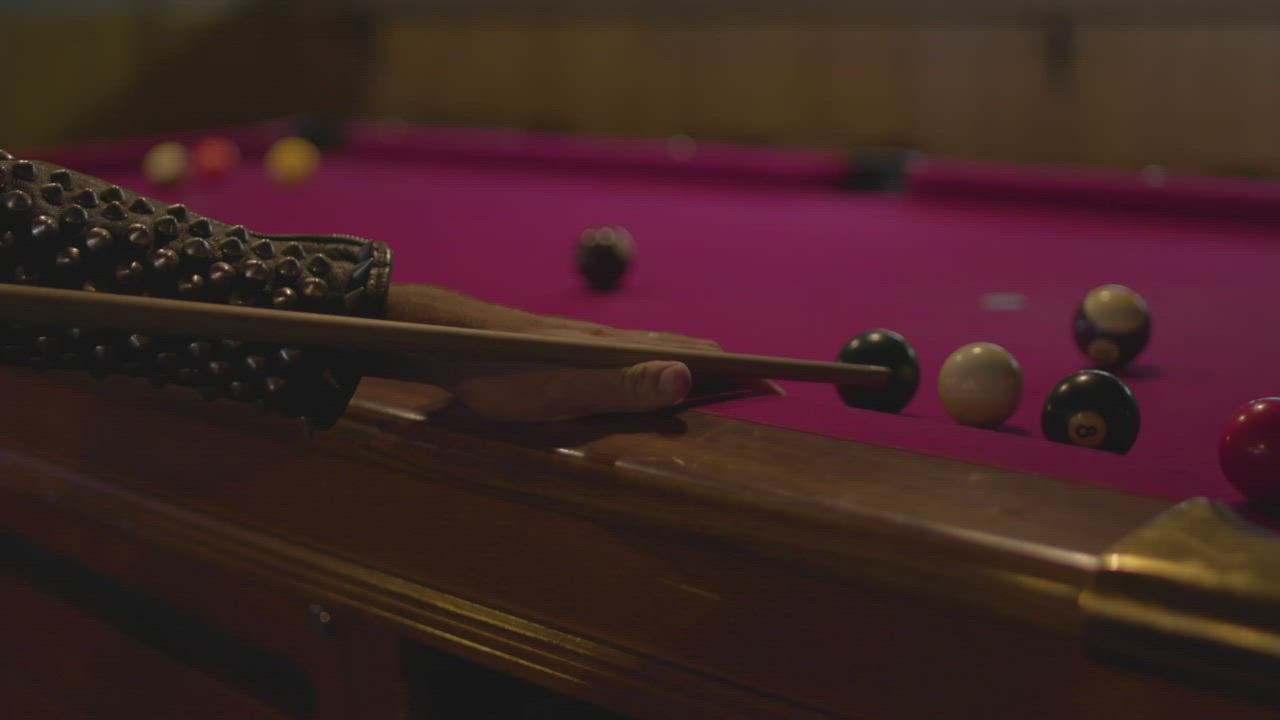 Punk person playing pool - Free Stock Video