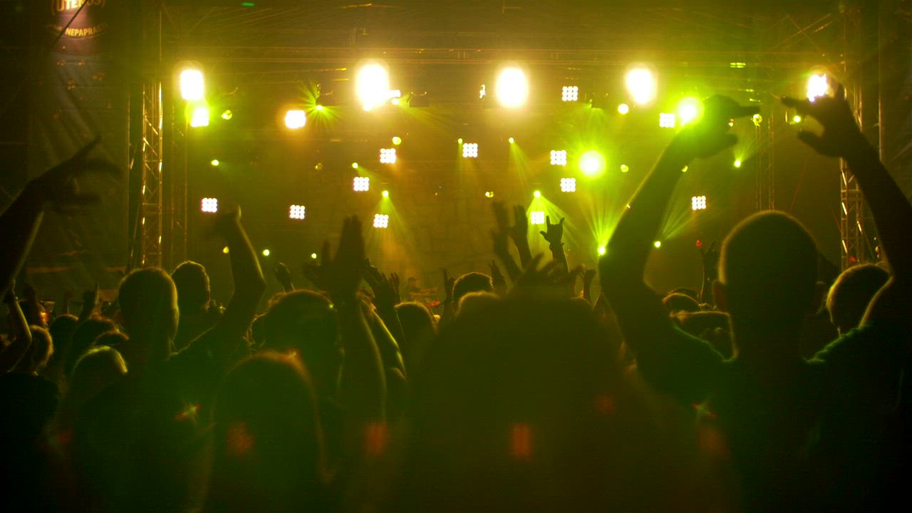 Festival crowd jumping and dancing at night - Free Stock Video