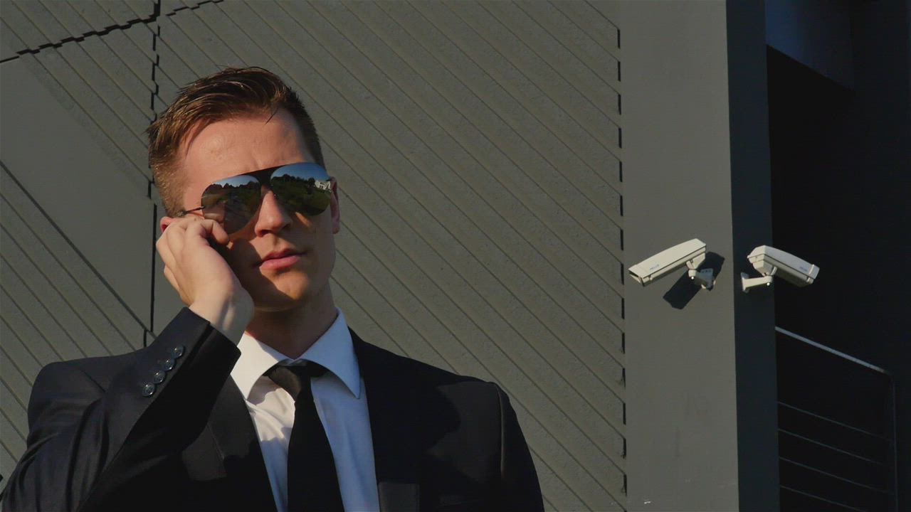 Special agent talking on the phone - Free Stock Video