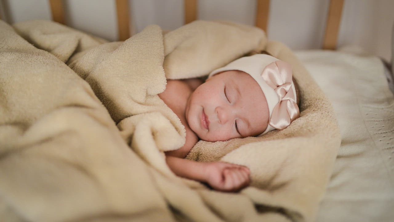 Cute little baby having a nap - Free Stock Video