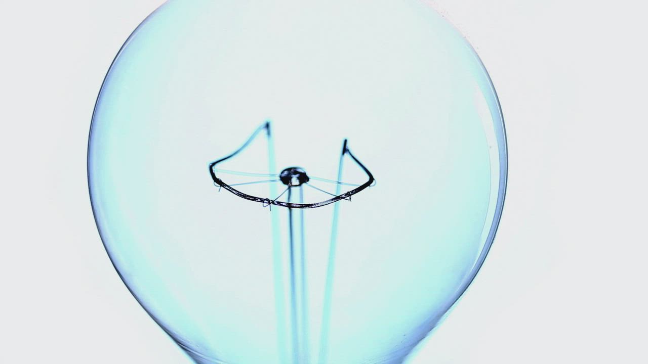 Electric light bulb turning on slowly - Free Stock Video