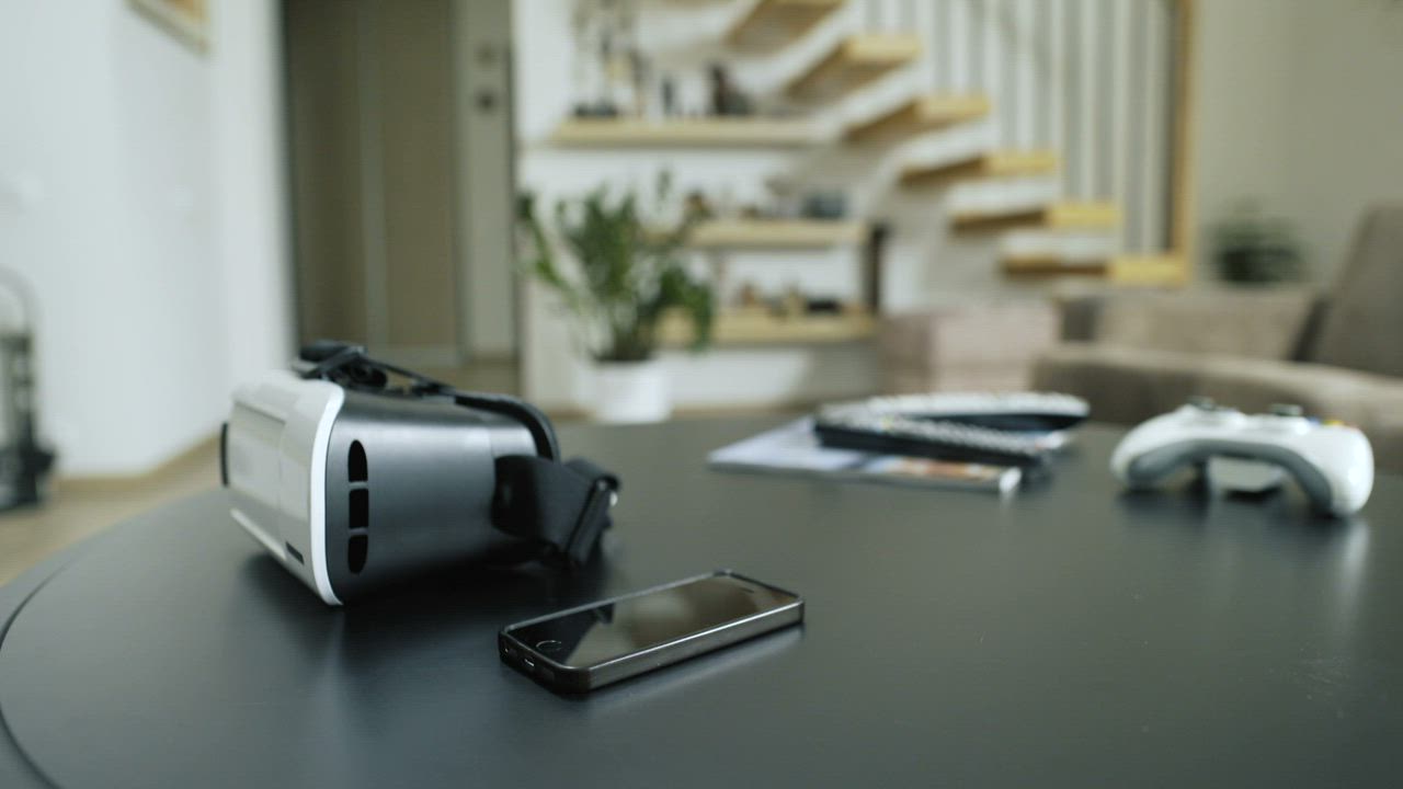 Virtual reality glasses on the table - Free Stock Video