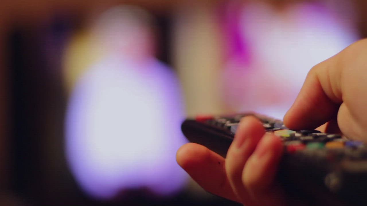 Tv remote control changing channels - Free Stock Video