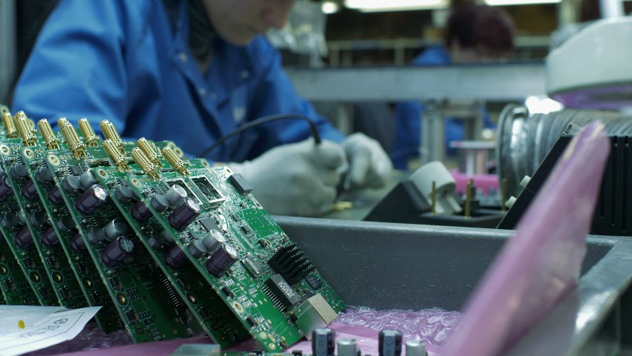 Circuit boards in the assembly line - Free Stock Video