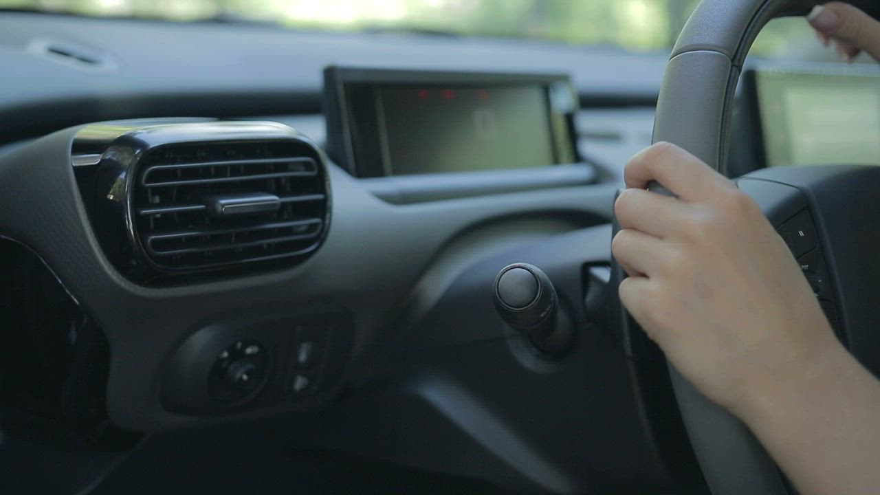 Woman using a turning signal - Free Stock Video