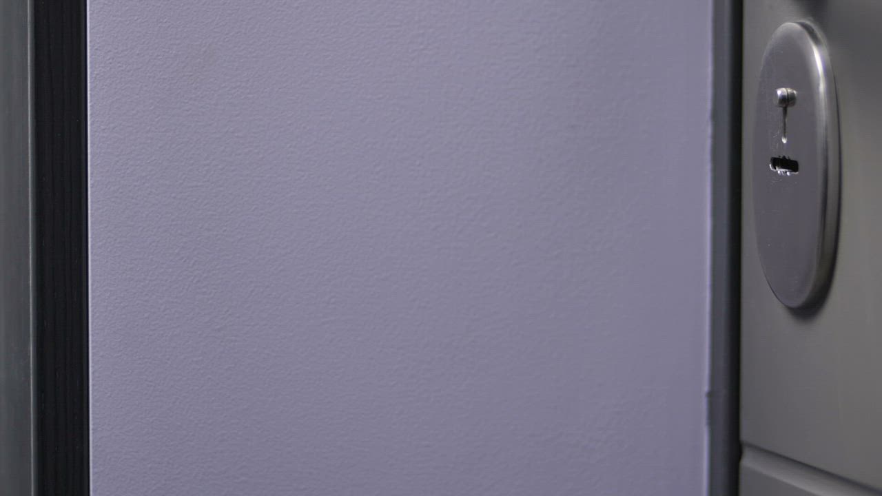 Opening a draw with a key - Free Stock Video