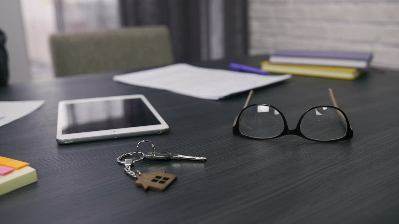 House keys on a table - Free Stock Video