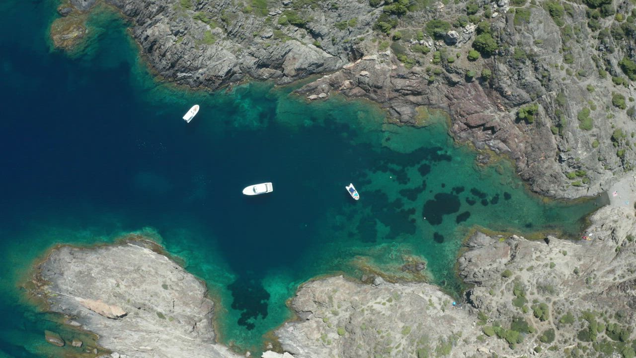 Yachts anchored in a cove - Free Stock Video