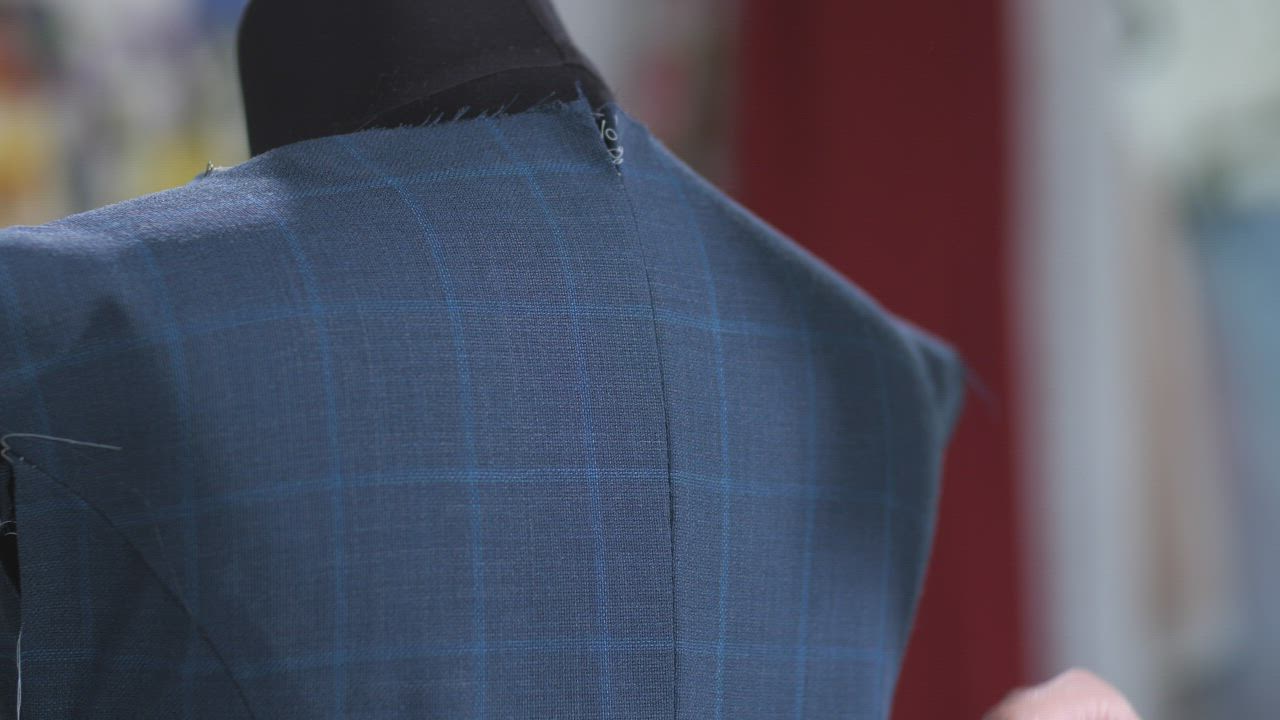 Tailor pinning lace to fabric - Free Stock Video