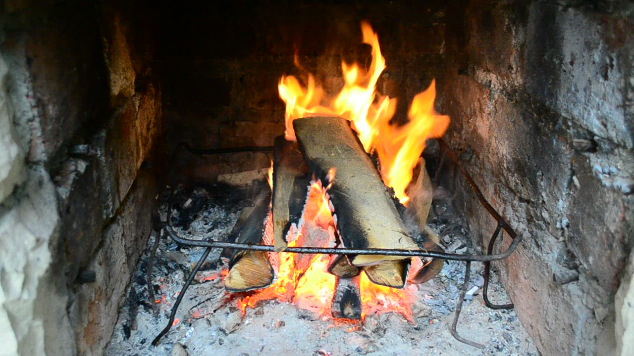 Log fire burning inside - Free Stock Video