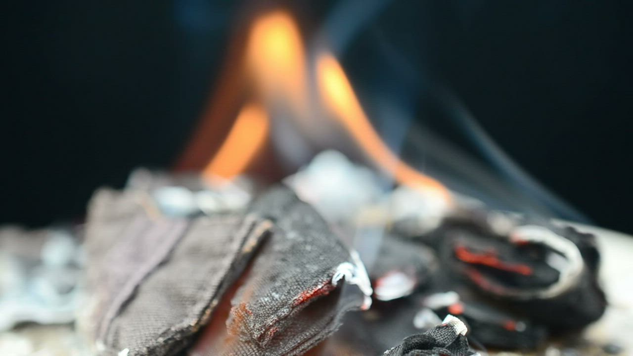 Burning fabric - Free Stock Video